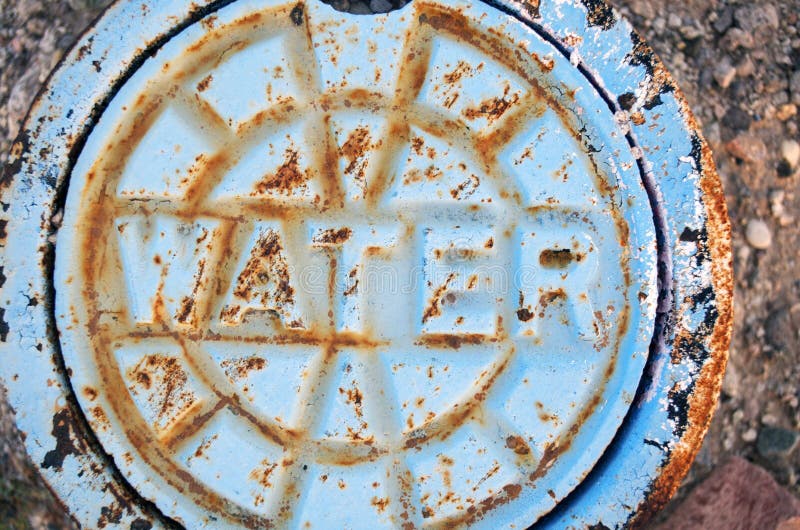 Turquoise and Metal Water Cover Stock Photo - Image of heavy, earth ...