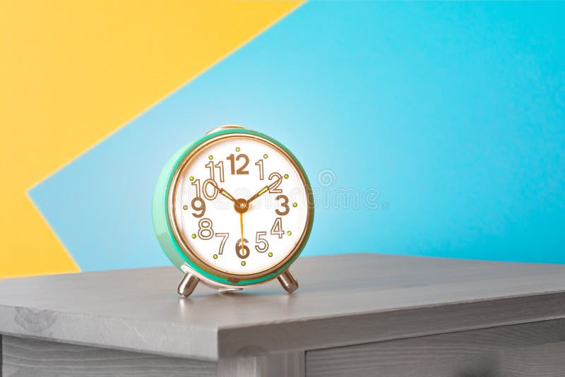 Turquoise Retro Alarm Clock on the Bedside Table Stock Image - Image of ...