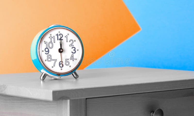 Turquoise Retro Alarm Clock on the Bedside Table Stock Photo - Image of ...