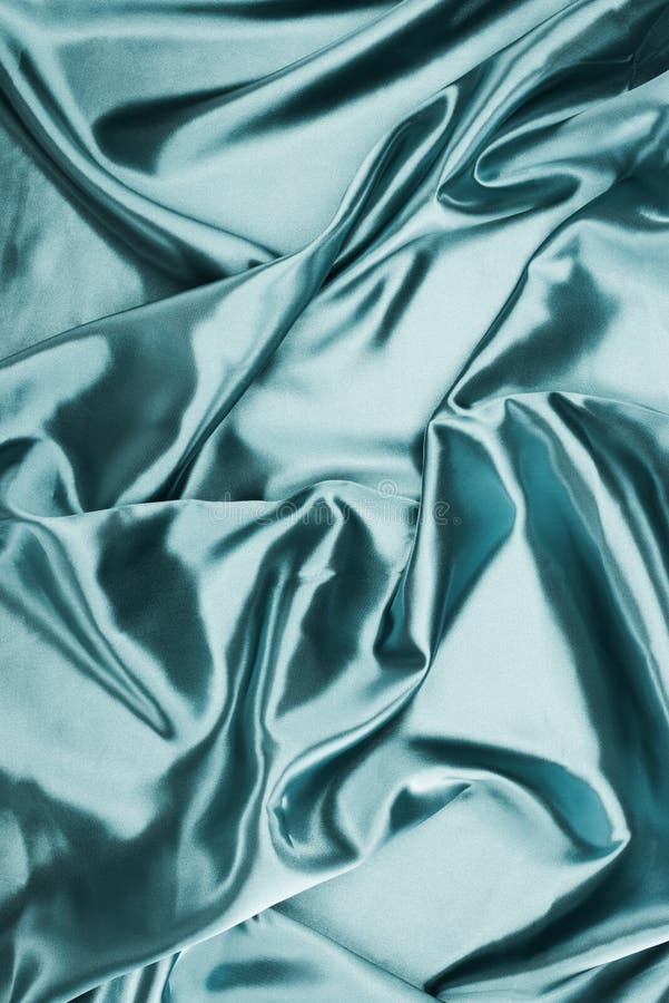 Turquoise shiny wavy satin stock photo. Image of silky - 129533538