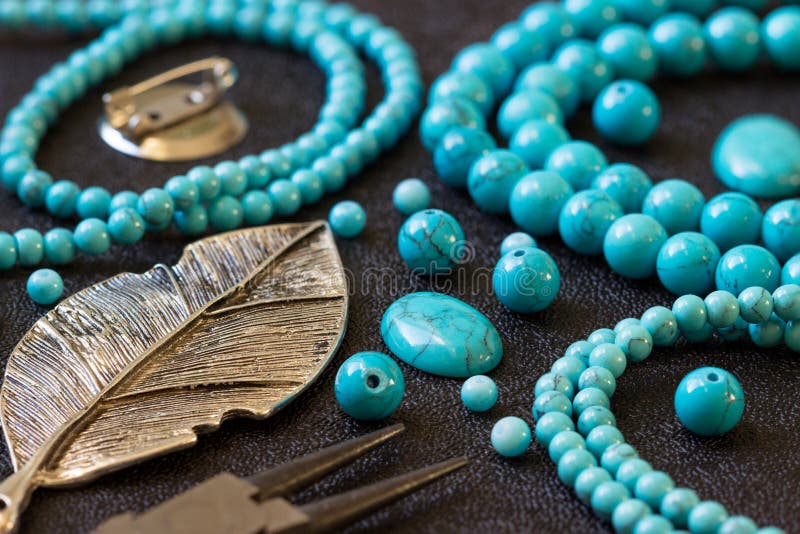 Turquoise Stones, Beads and Tools for Making Jewelry. Needlework Stock ...