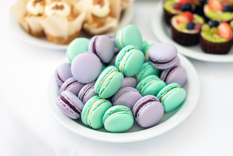 Turquoise and Violet Macarons. Wedding Cakes on the Table. Sweet ...