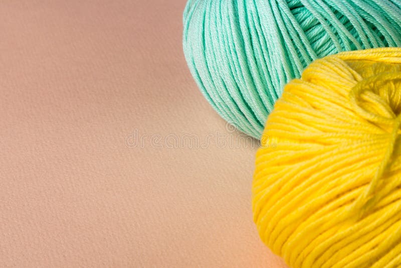 Turquoise and Yellow Tangle of Thread on a Pink Background Stock Image ...