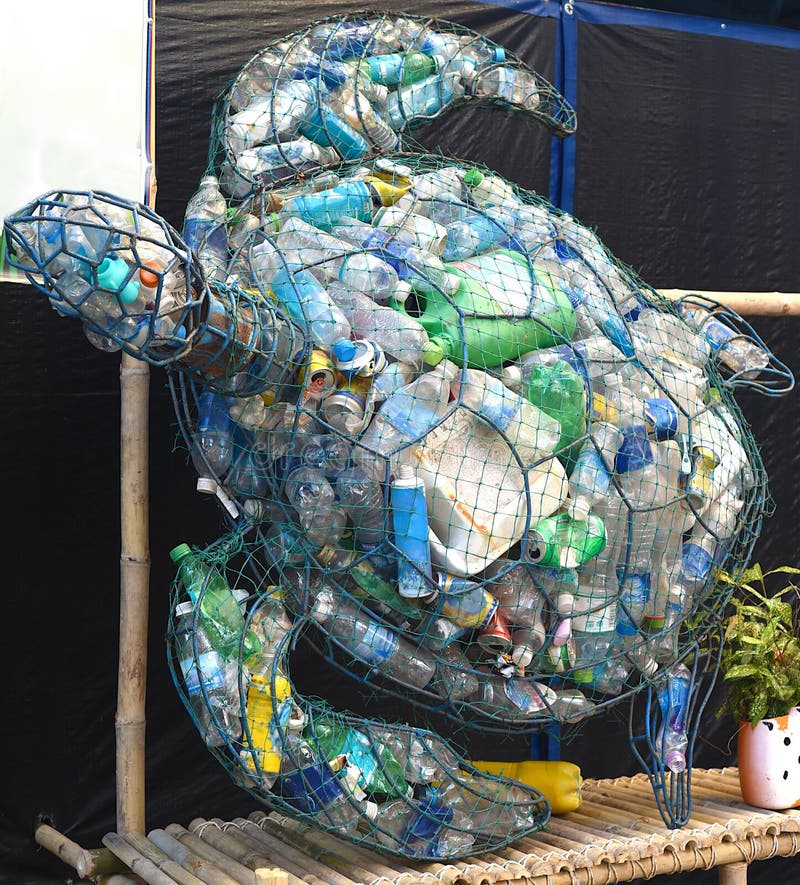 Turtle-shaped Trash Can Full of Plastic Bottles and Cans As a ...