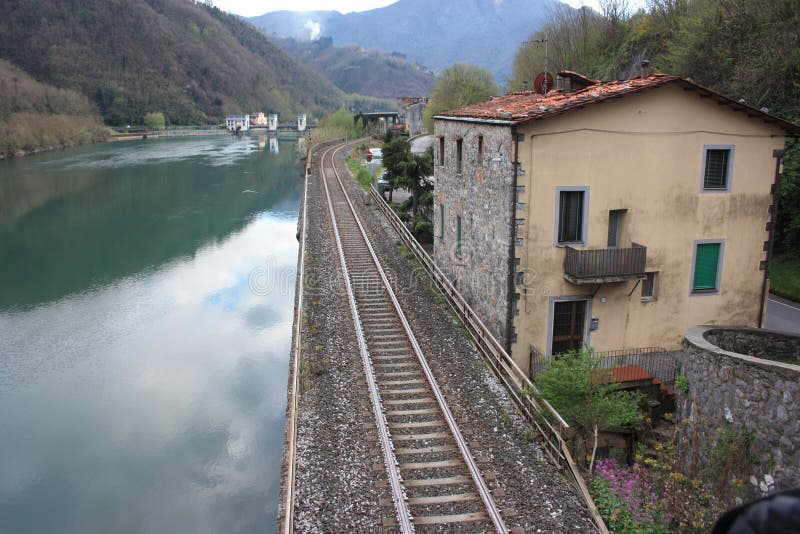 The Tuscan Serchio River in Borgo a Mozzano and the Reflection of the ...