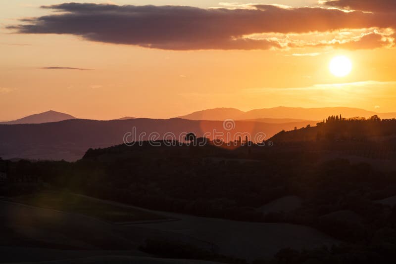 Tuscany sunset stock photo. Image of scene, meadow, scenery - 129771116