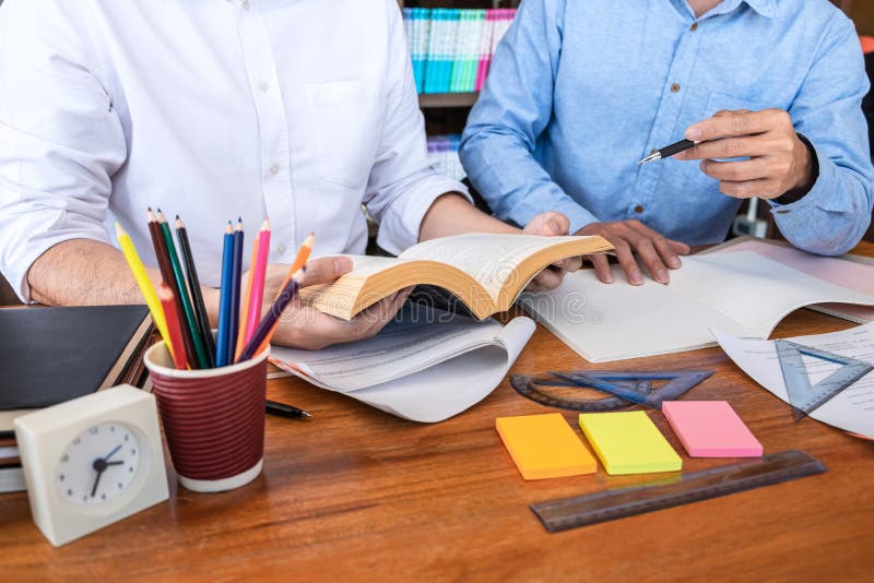 Tutor Books with Friends Education, Group Students Studying and ...