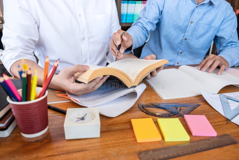 Tutor Books with Friends Education, Group Students Studying and ...