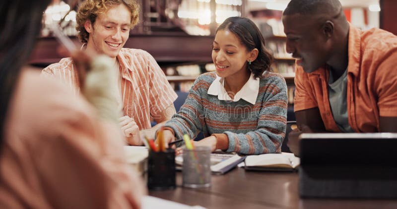 Tutor, College and Friends or Students in Library for Assignment ...