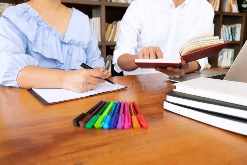 Tutor, learning, education, Group of young people learning studying ...