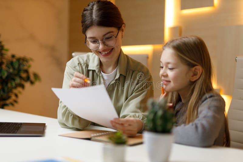 Tutor in a Private Lesson with a Small Child of a Girl Stock Photo ...