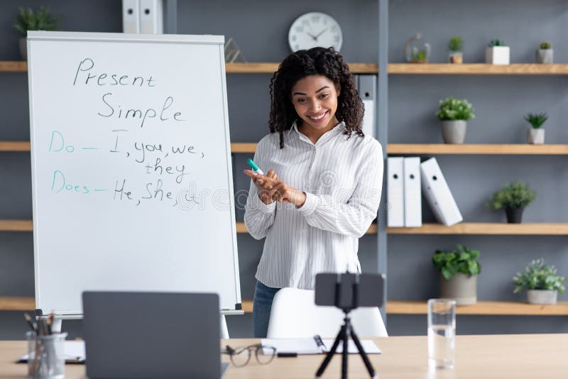 Tutor Teaches Students Remotely, Explains Rules of English Language ...