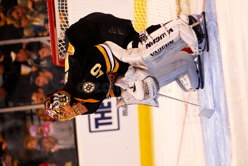Tuukka Rask makes a save editorial stock image. Image of puck - 22373639