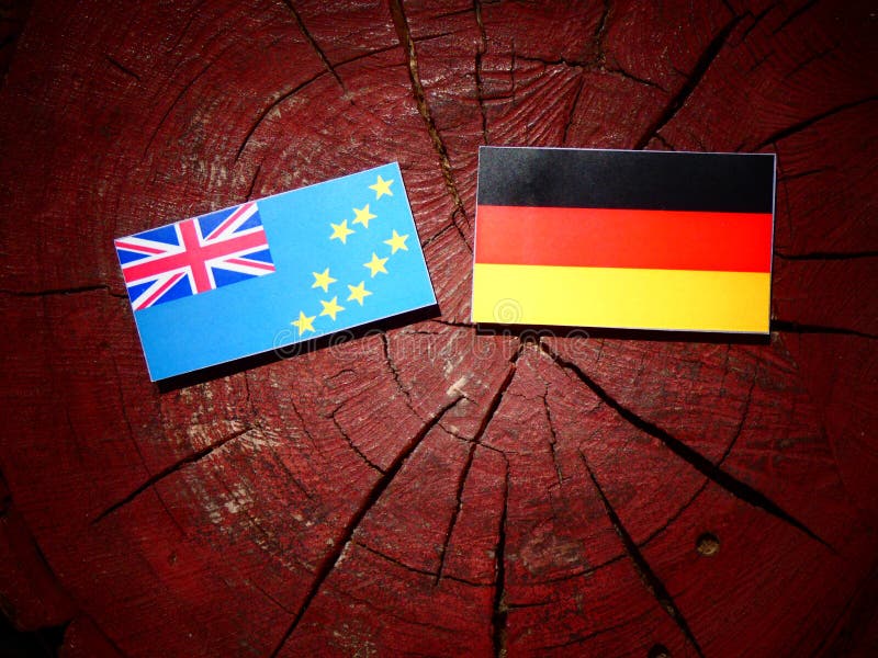 Tuvalu Flag with German Flag on a Tree Stump Stock Image - Image of ...