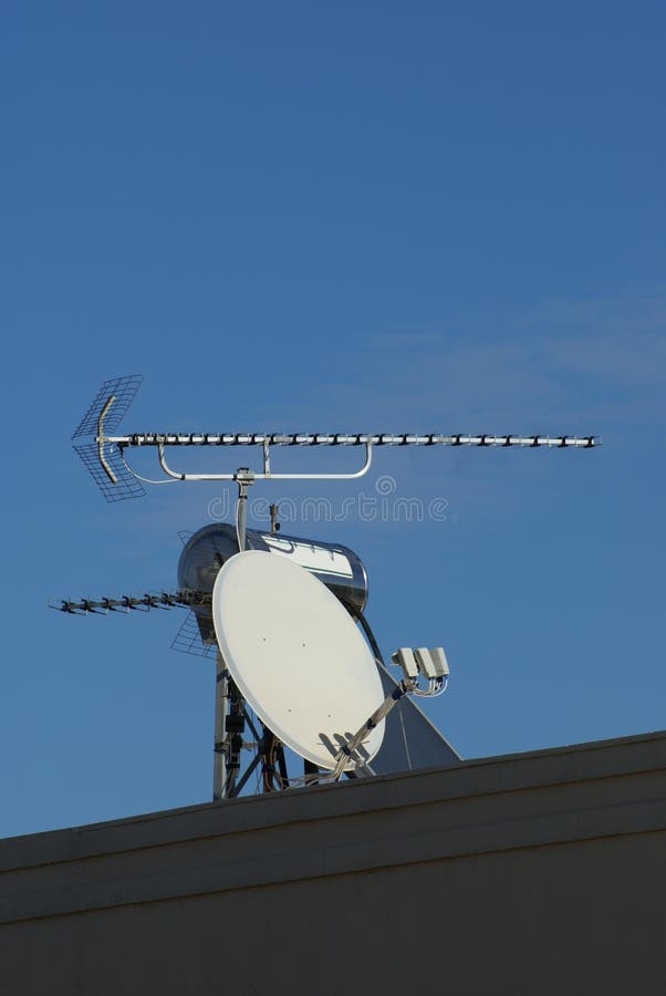 TV Aerial, Satellite Dish, & Solar Water Heating Panel. Stock Photo ...
