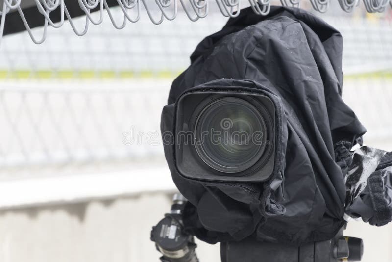 TV Camera Broadcasting Live a Race at Motor Racing Track. Stock Photo ...