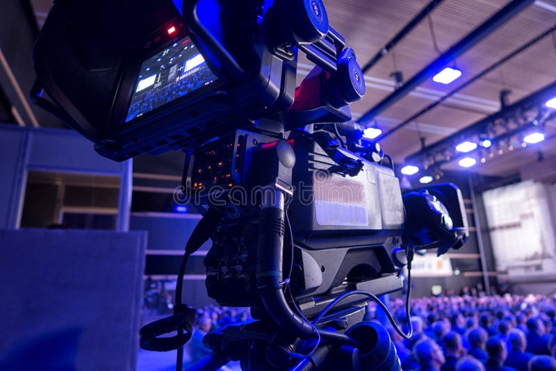 Tv Camera in a Concert Hall. Digital TV Camera Stock Photo - Image of ...