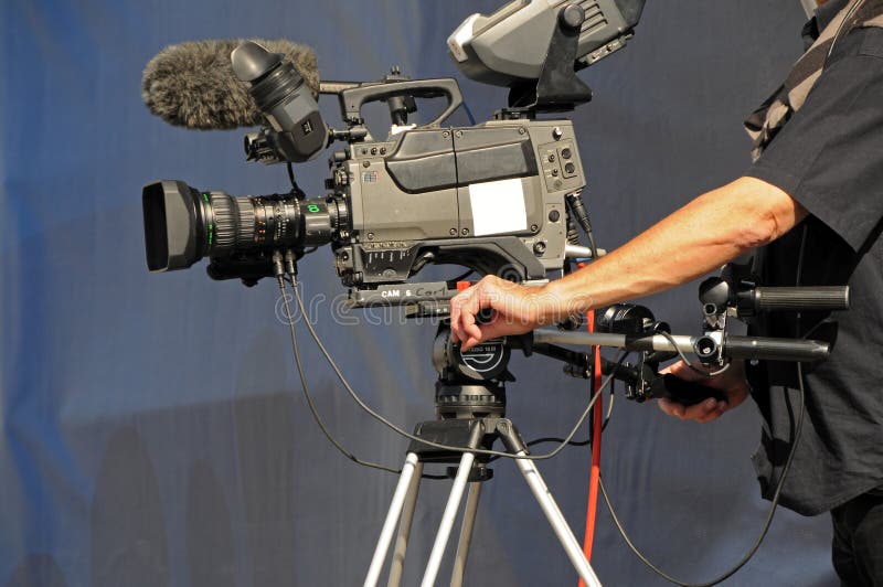 TV cameraman stock image. Image of cameraman, movie, tripod - 5473331