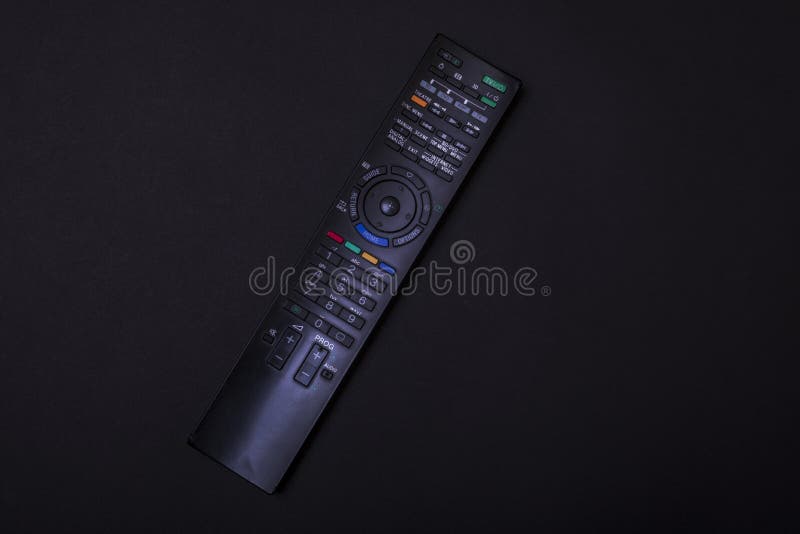 TV Control on a Black Background. Multi Control Concept. Remote Control ...