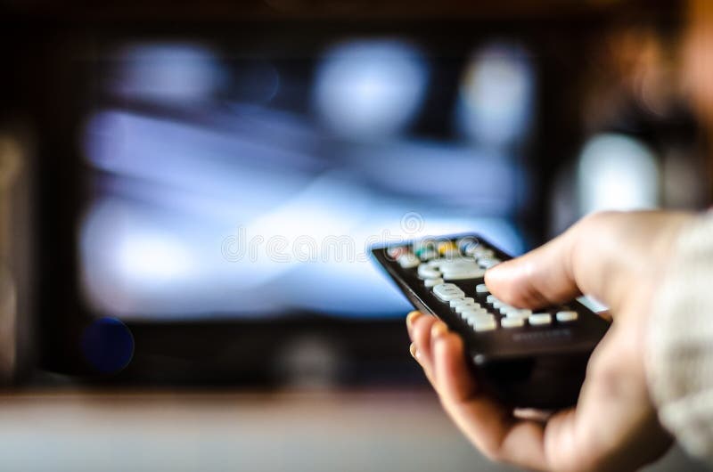TV control in the hand stock photo. Image of cityscape - 57608040
