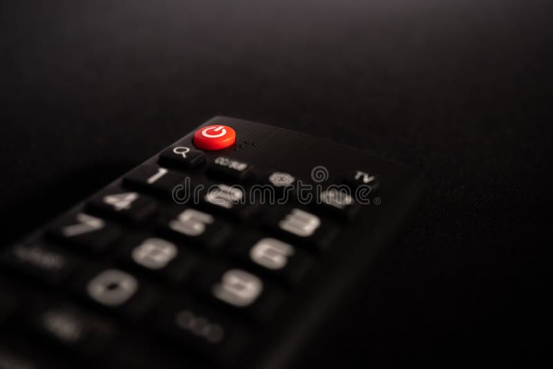 TV Power Button on the Remote Control on Black Background Stock Image ...