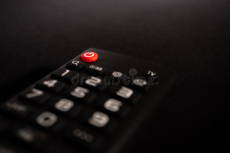 TV Power Button on the Remote Control on Black Background Stock Image ...