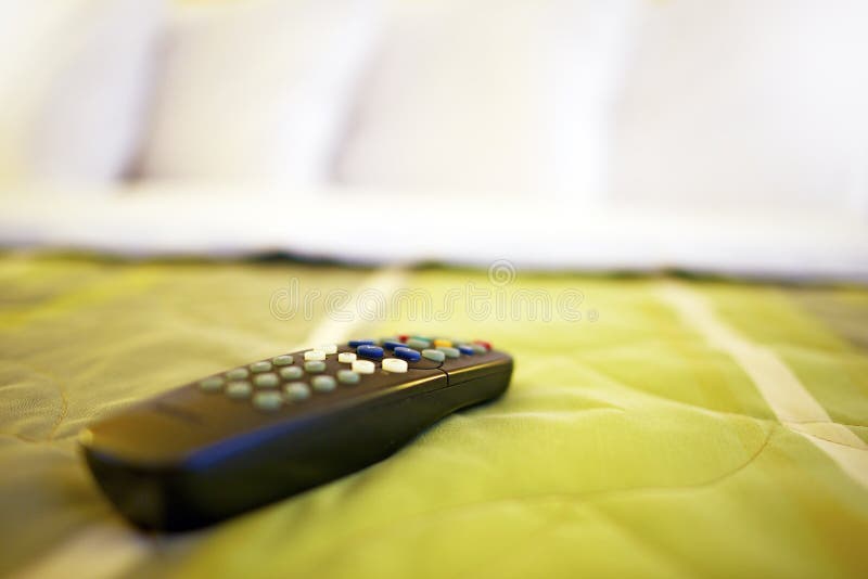 TV Remote on Bed stock image. Image of cable, news, sheet - 35501307