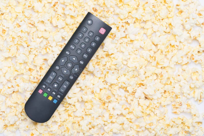 TV Remote Control is on the Background of Popcorn Stock Image - Image ...