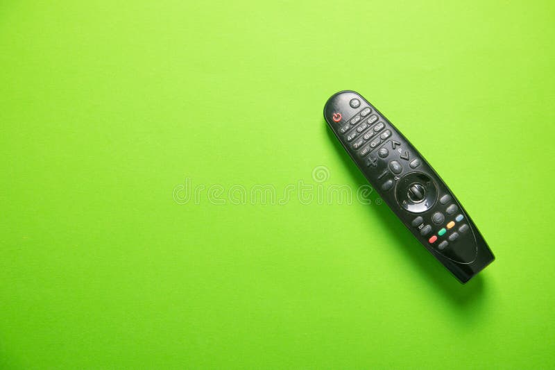 TV Remote Controller on the Green Background Stock Image - Image of ...