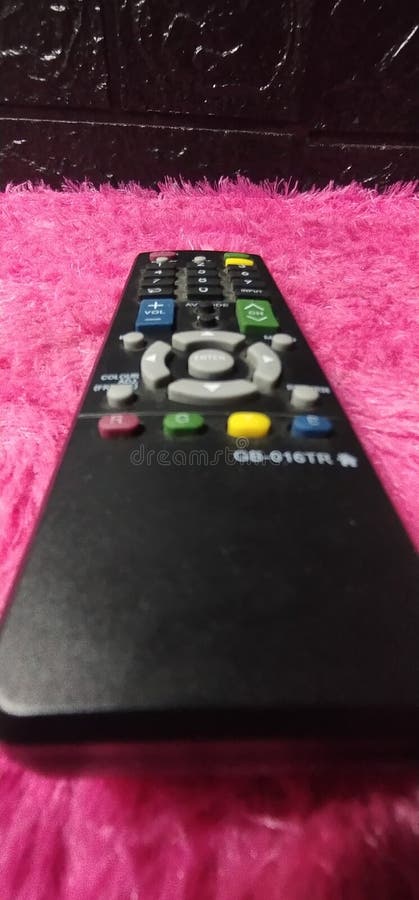 TV Remote Controller Rotating on Pink Background. Editorial Photo ...