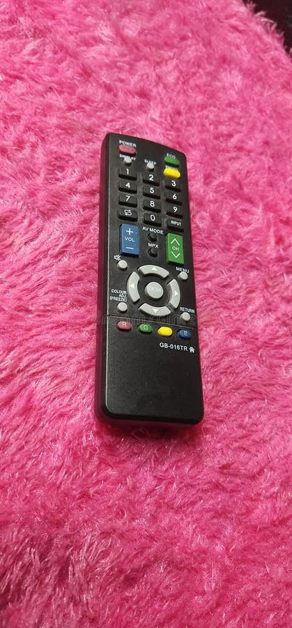 TV Remote Controller Rotating on Pink Background. Editorial Stock Image ...