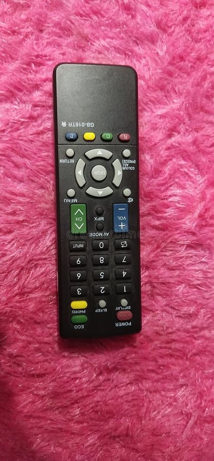 TV Remote Controller Rotating on Pink Background. Editorial Stock Photo ...