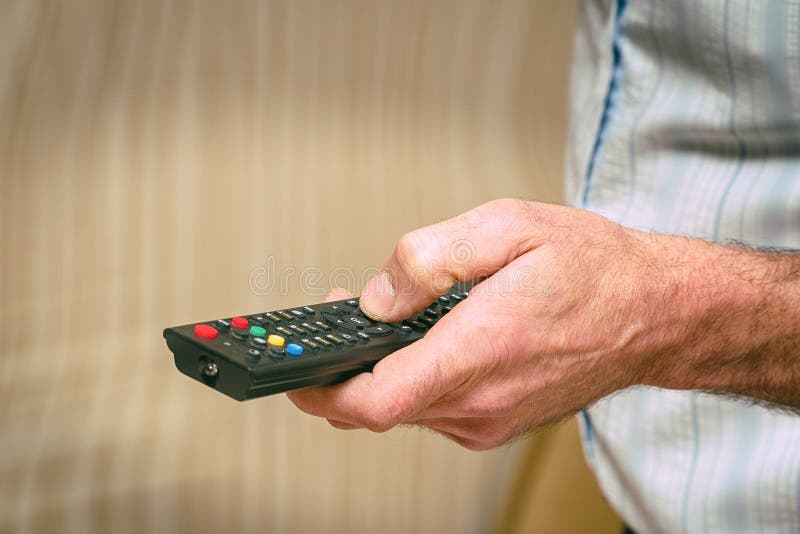 TV Remote in the Hand of Man Stock Image - Image of media, button ...