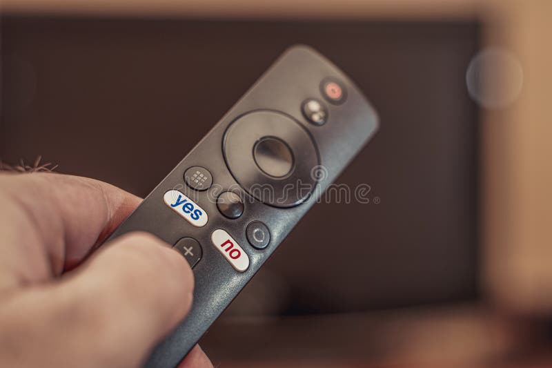 TV Remote in Hand with Yes and No Button Labels. the Inscription No in ...