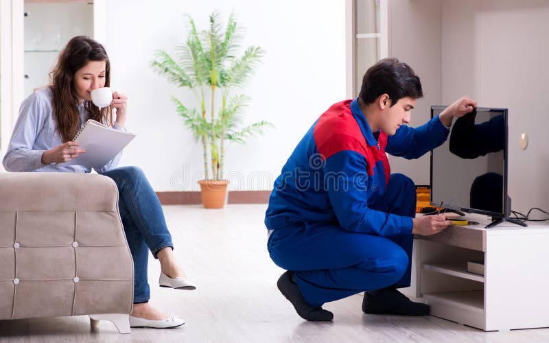 The Tv Repairman Technician Repairing Tv at Home Stock Image - Image of ...