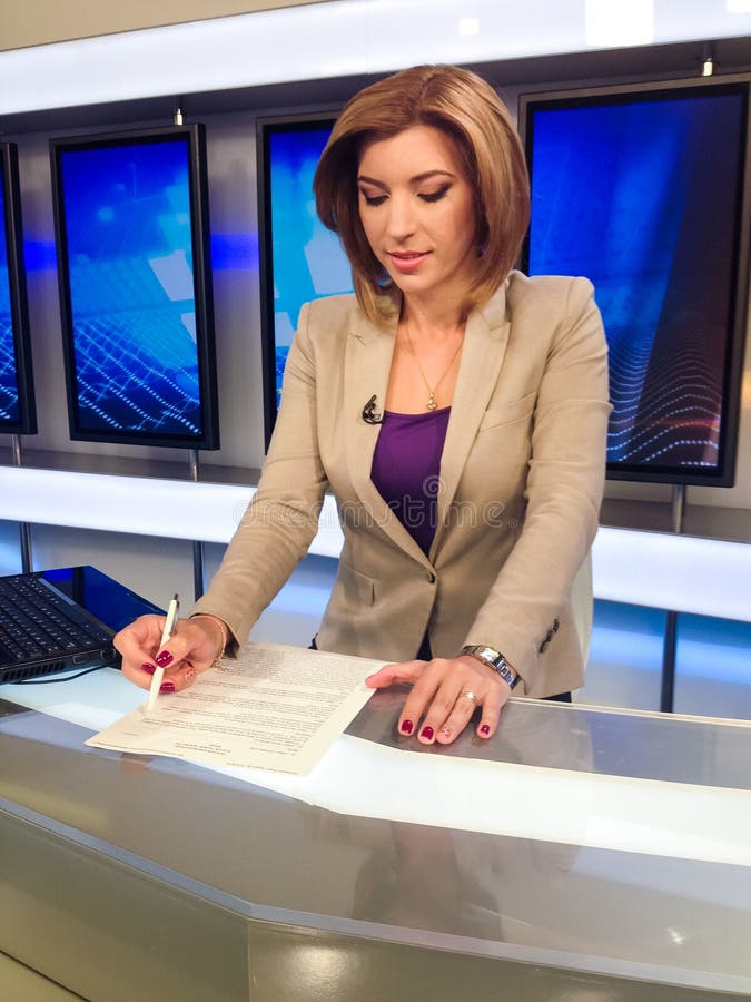 TV Reporter At The News Desk Stock Photo - Image of reporter ...