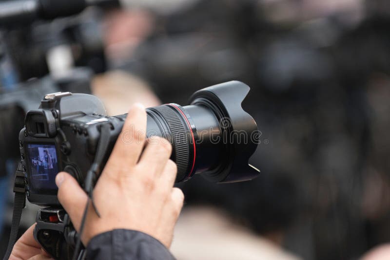 TV Reporter Photographing in Press Room Stock Photo - Image of people ...