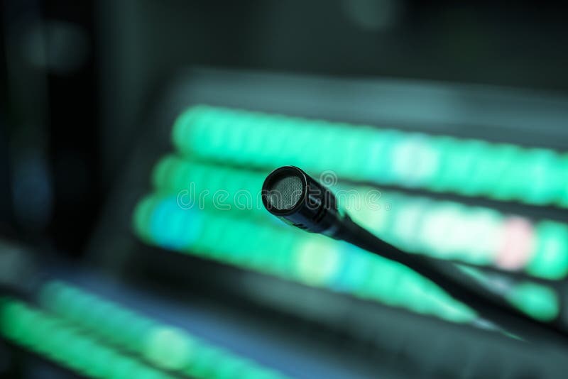 TV Studio Microphone. Remote Control TV with a Microphone a Bit Blurred ...