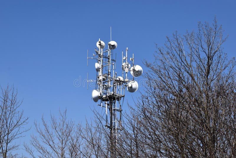 TV transmitter with trees stock image. Image of antenna - 189698717
