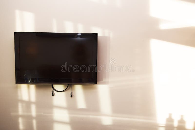 TV on the Wall, Lit by Sunlight Stock Photo - Image of apartment ...