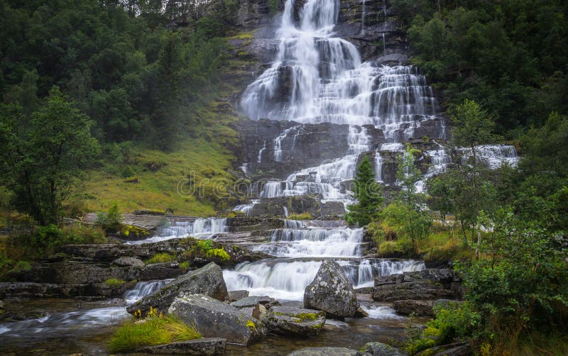 Tvindefossen Waterfall in Norway Stock Image - Image of green, flowing ...