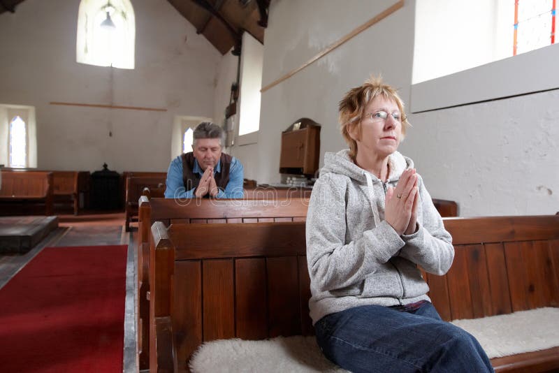 Twee mensen het bidden stock afbeelding. Image of doorgang - 29540941