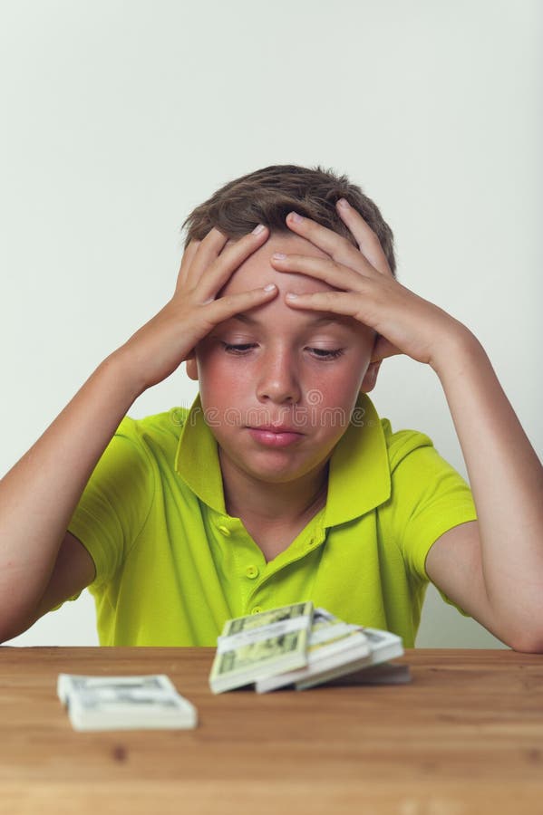 Tween Boy Sitting at the Table with Exercise Book Stock Image - Image ...