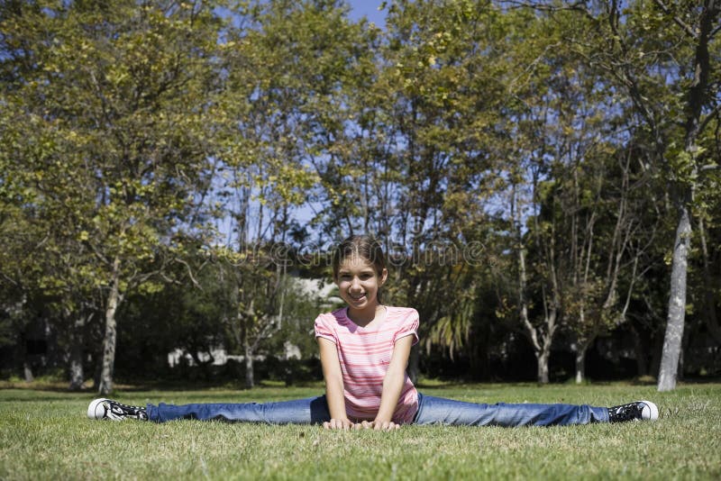 Tween Girl doing Headstand stock image. Image of denim - 11084167