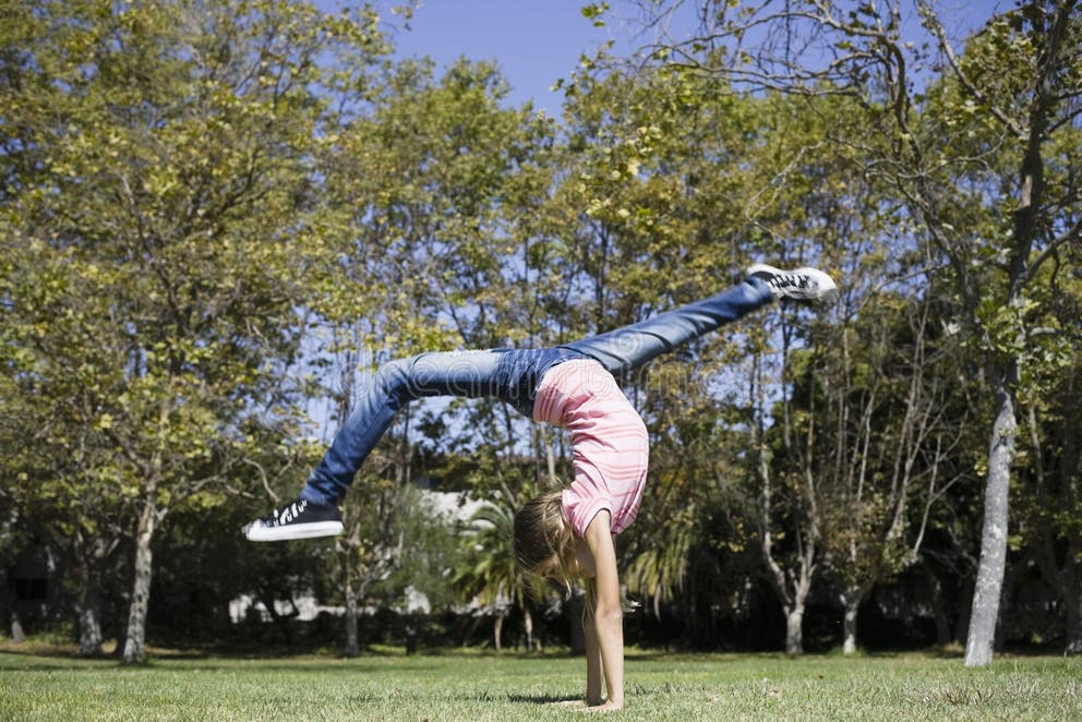 Tween Girl Doing Gymnastics Stock Photo - Image of outside, daytime ...