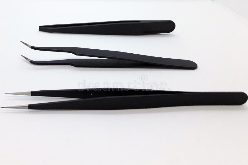 A Set of Three Tweezers Types Stock Photo - Image of open, reflective ...