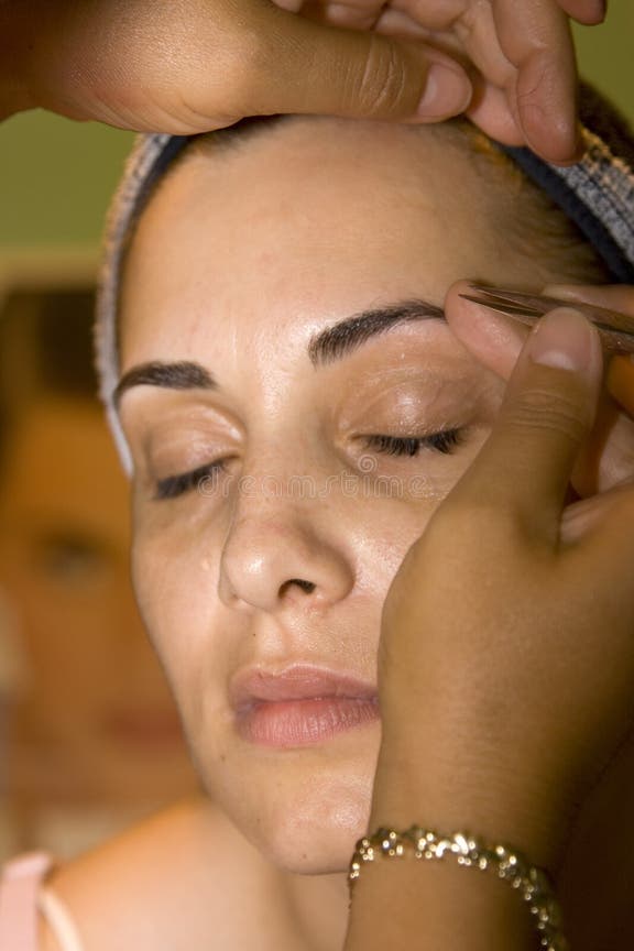 Tweezing eyebrow stock photo. Image of metal, eyesight - 6248156