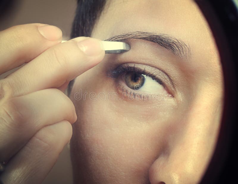 Women Pulling Eyelids Stock Photos - Free & Royalty-Free Stock Photos ...