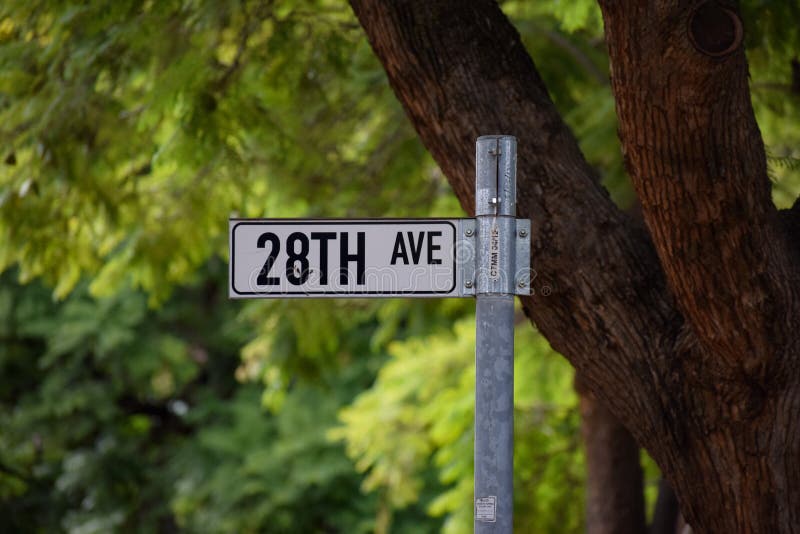 28th Ave Street Name Sign stock image. Image of downtown - 188569707