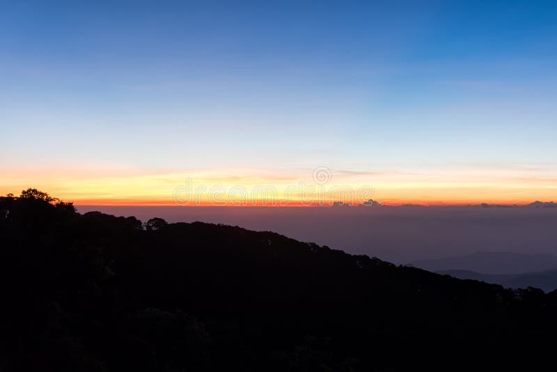 Twilight on Clear Sky before Sunrise Over Dark Mountains in Shadow ...